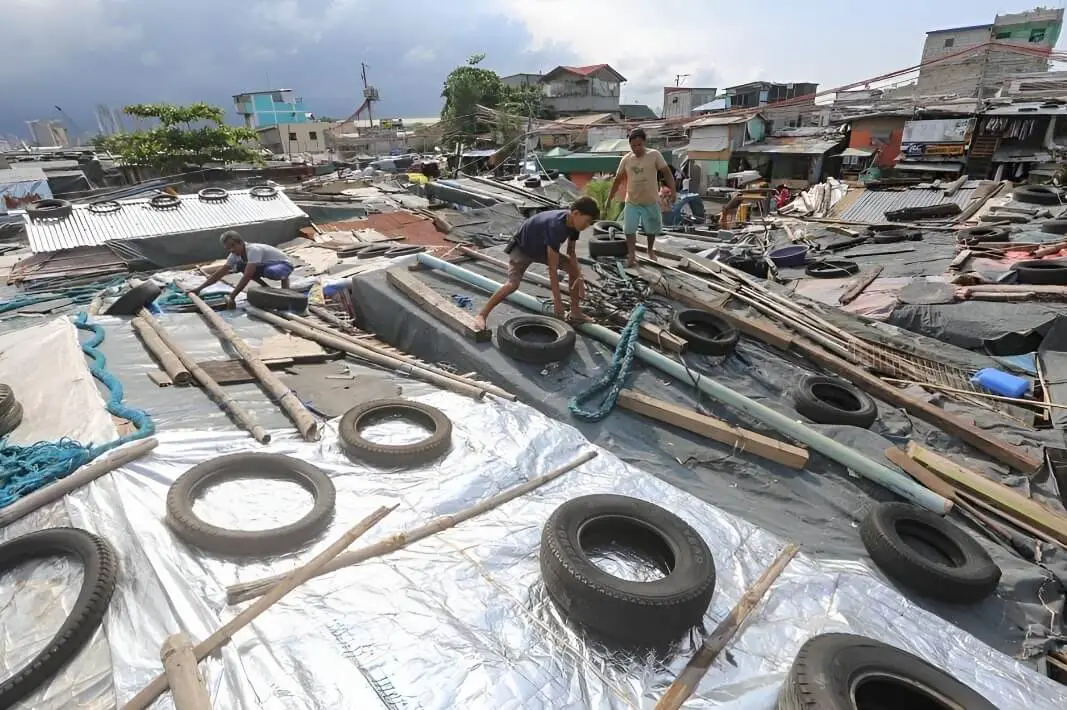 Why Do People Put Tires on Their Roofs? Discovering the Reasons